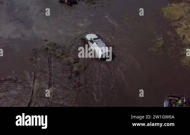 Off Road Free Fest. SUVs drive the swamp. Cars skid in the mud Stock ...