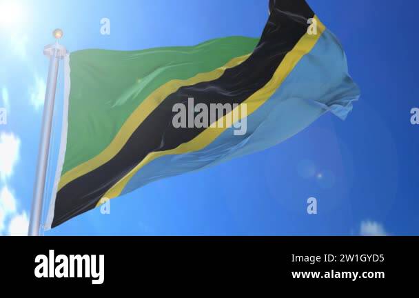 Tanzania animated flag in the wind with blue sky in the background ...