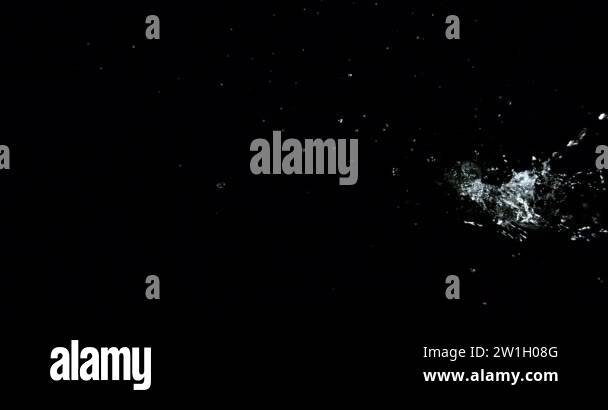 Water Exploding and Splashing against Black Background, Slow motion 4K ...