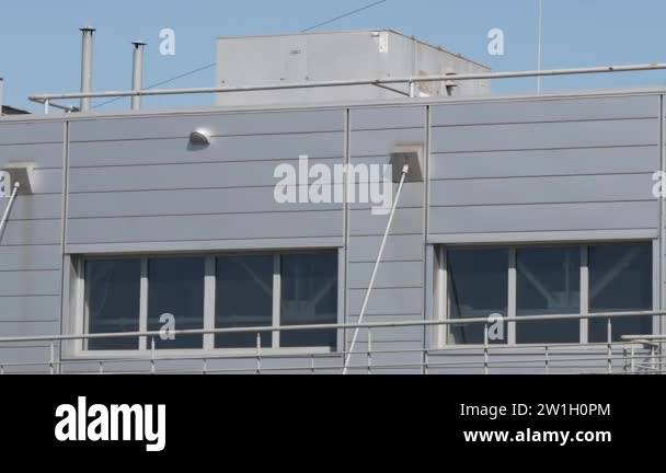 Modern office warehouse building. Double-glazed windows on windows ...