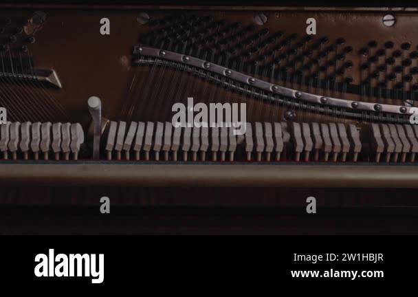 Gavel of the string open mechanism. Inside of a piano. 4k Stock Video ...