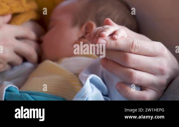 Mother baby arms Stock Videos & Footage - HD and 4K Video Clips - Alamy