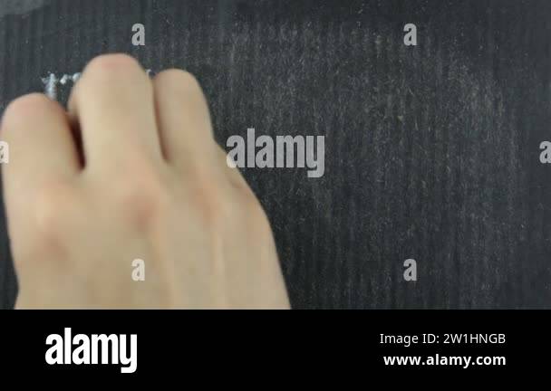 The person marks the word YES in the selection column with chalk on ...