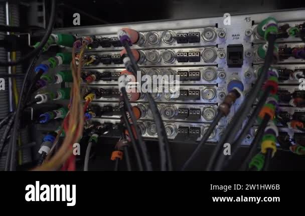 Back commutation panel of telecommunication video switcher with lot of ...
