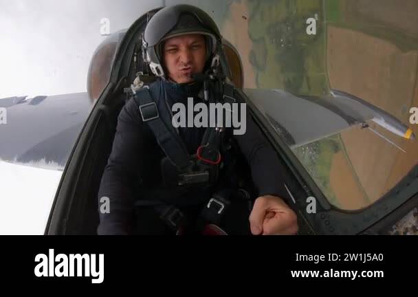 Second pilot man dreaming that shoots from a machine gun of aircraft ...