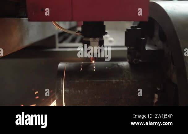 Plasma cutting of metal pipe on a CNC machine. Fire cutting of metal ...