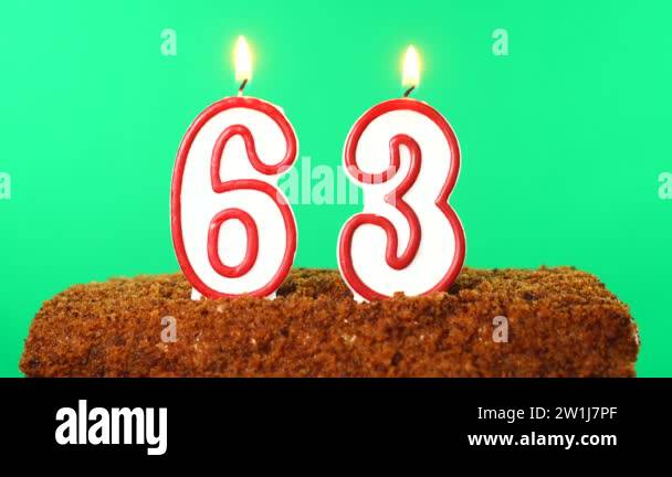 Cake with the number 63 lighted candle. Chroma key. Green Screen ...