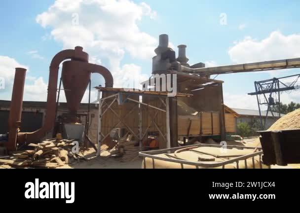 Sawing machine at wood production factory. Timber material processing ...