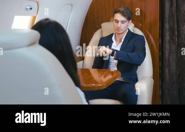 Handsome Rich Man Flying in Private Jet Plane. Young Confident ...