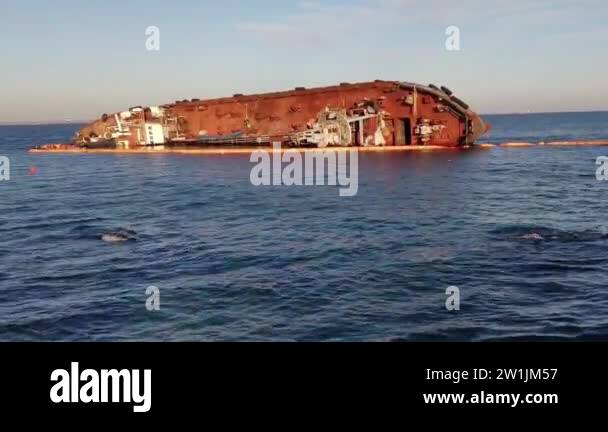 Closeup sunken tanker. Ship through after storm ashore. The tanker lies ...
