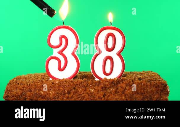 Cake with the number 38 lighted candle. Chroma key. Green Screen ...