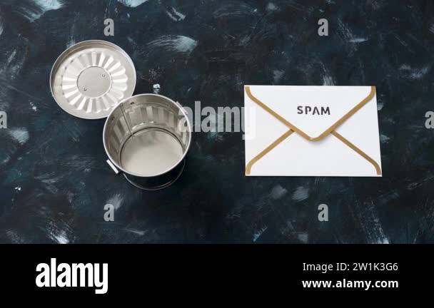 inbox organisation and clean-up, hand grabbing spam email envelopes and ...