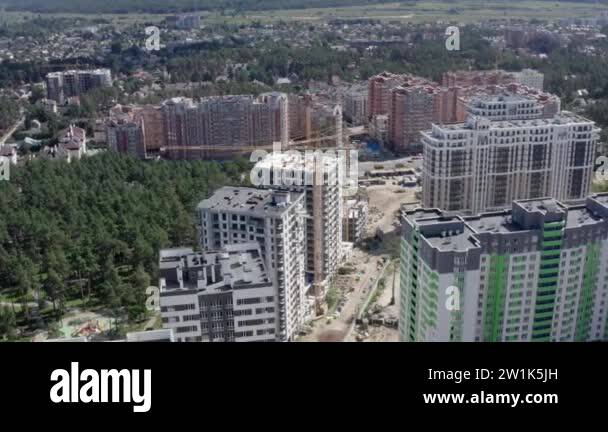 Construction of multi-story modern apartment building in the green zone ...