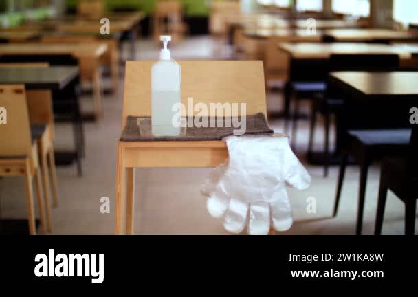 close-up. antiseptic dispenser and disposable gloves when entering self ...