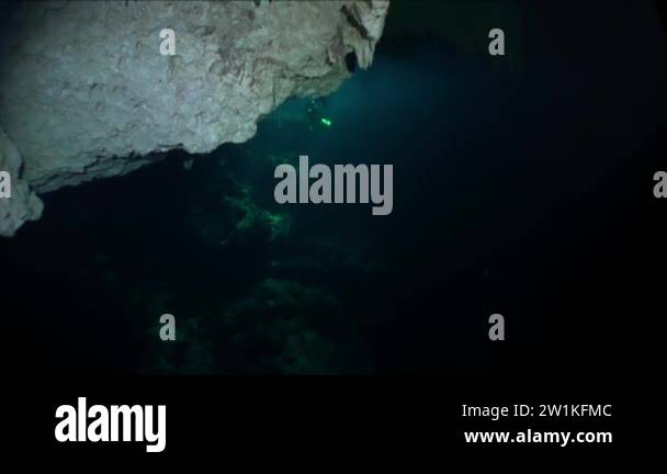 Cave diving in underground water of underwater Yucatan Mexico cenotes ...