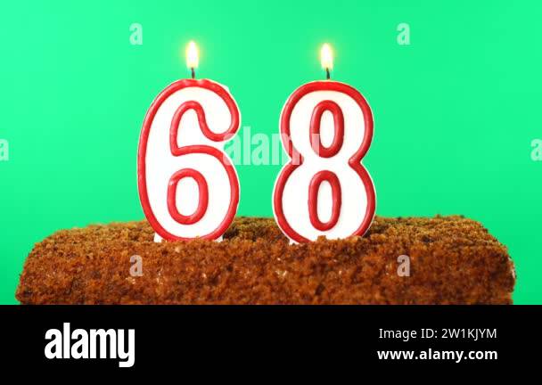 Cake with the number 68 lighted candle. Chroma key. Green Screen ...