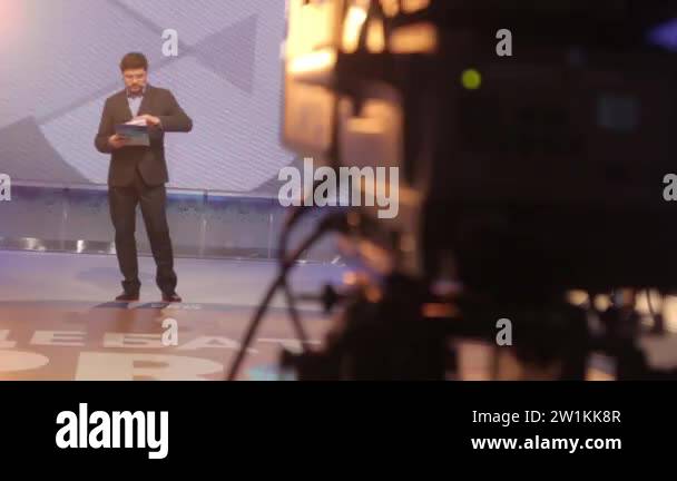 Male man TV presenter in a TV studio. TV presenter. TV host Stock Video ...