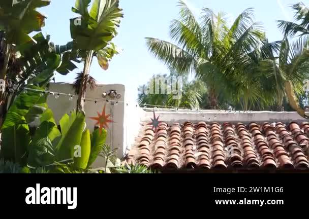 Mexican colonial style suburban, hispanic house exterior, green lush ...