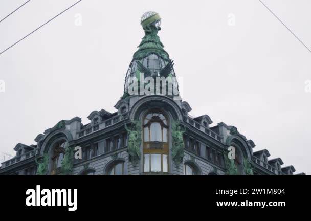 Bottom view of historic city building with greek sculptures. Action ...