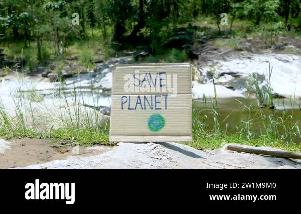 The nature conservation sign on stream flowing background. The concept ...