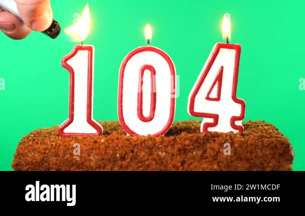 Cake with the number 104 lighted candle. Chroma key. Green Screen ...