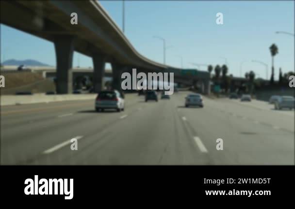 Driving on intercity freeway in Los Angeles, California USA. Defocused ...
