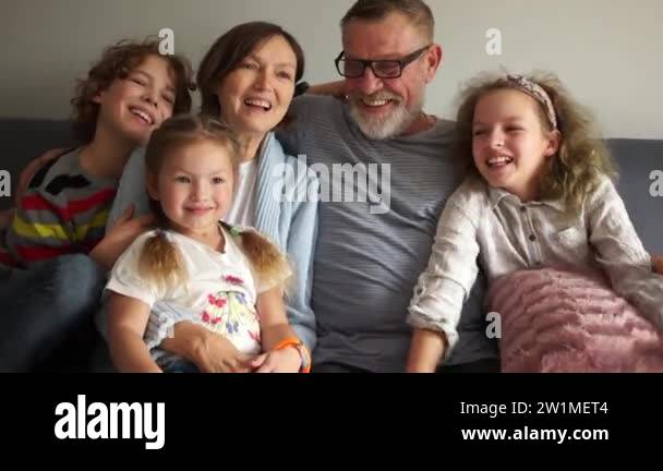 Lovely big happy family. Portrait of grandparents with three ...
