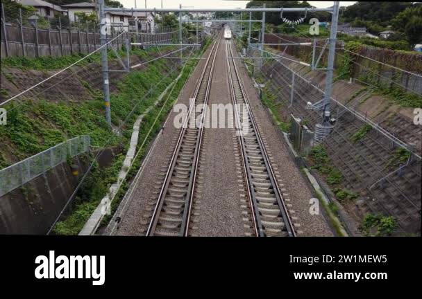 2020 Sep 01 Yokohama, Japan. Shinkansen, bullet train, passes under the ...
