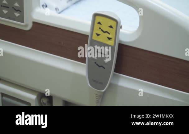 Hospital bed position control panel with buttons weighing on the bed ...