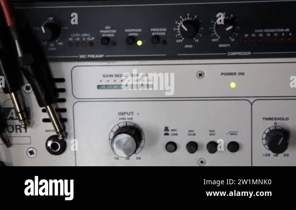 A rack of audio compressors and other components of sound reinforcement ...