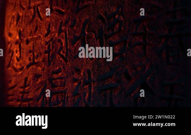 Chinese Writing Stone Carving In Fire Light Stock Video Footage - Alamy