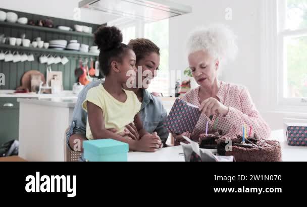 Three generations of family celebrating a birthday together Stock Video ...