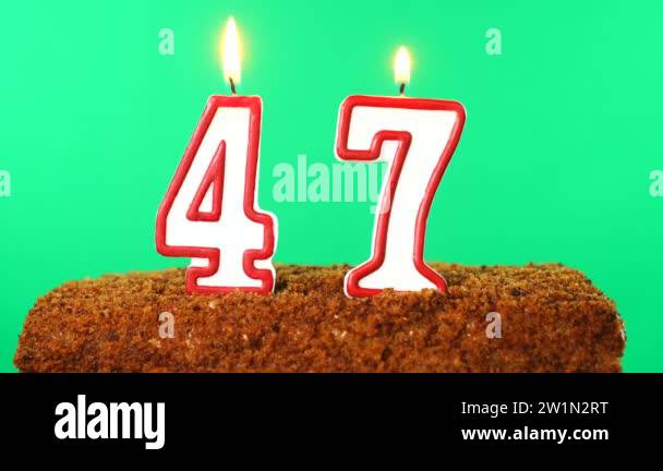 Cake with the number 47 lighted candle. Chroma key. Green Screen ...