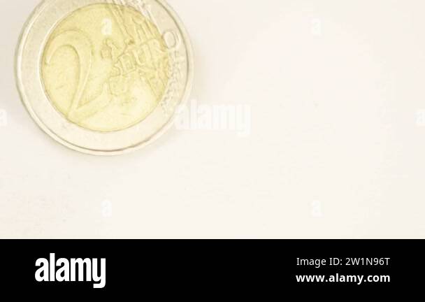 2 Euro coin twirling and turning Stock Video Footage - Alamy