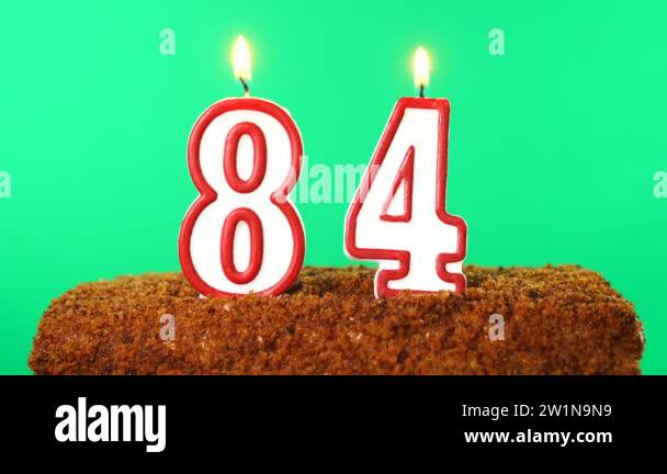 Cake with the number 84 lighted candle. Chroma key. Green Screen ...