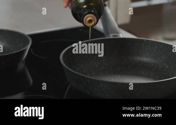 Pouring oil into frying pan Stock Videos & Footage - HD and 4K Video ...