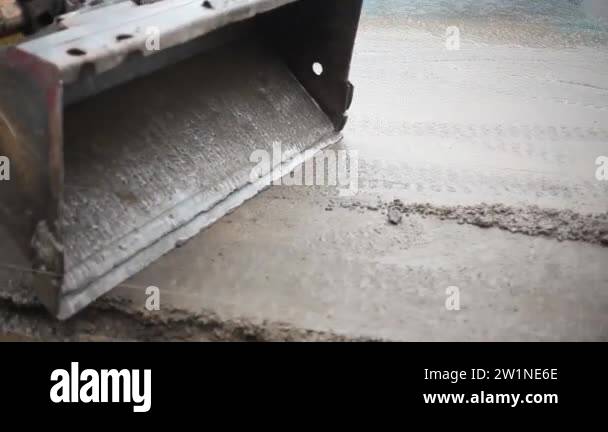 Road repair. Installation of curbs on the highway. The workers are ...