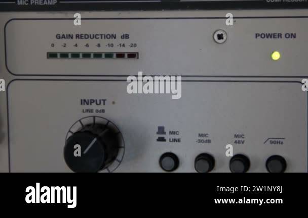 A rack of audio compressors and other components of sound reinforcement ...