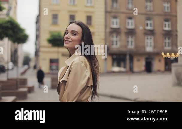 Backside Tracking Footage of Attractive Young Girl Walking othe Streets ...