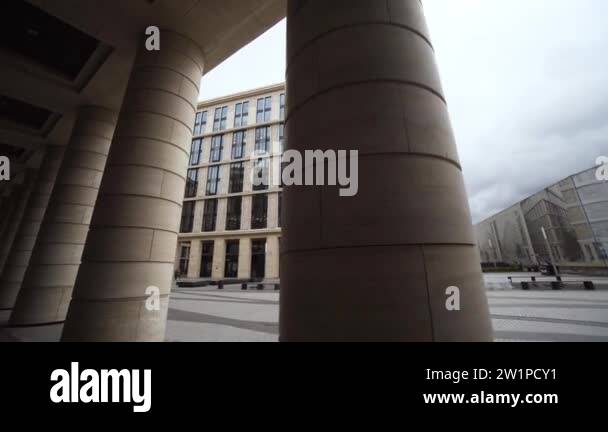 Modern office building with columns and fountain. Action. Beautiful ...