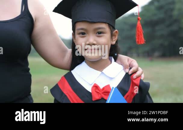 Educational concepts. Mother is congratulating her daughter on ...