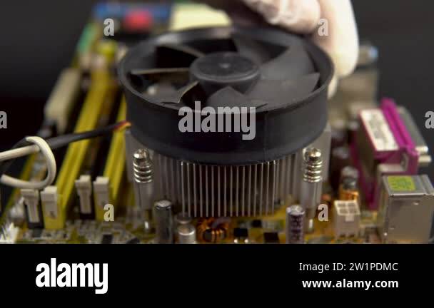 Installing A Processor Cooler On The Motherboard Cpu Cooling System On Pc View Of The