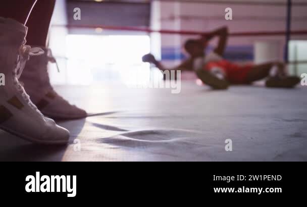 Side view low section of the boots of a female boxer moving and jumping ...
