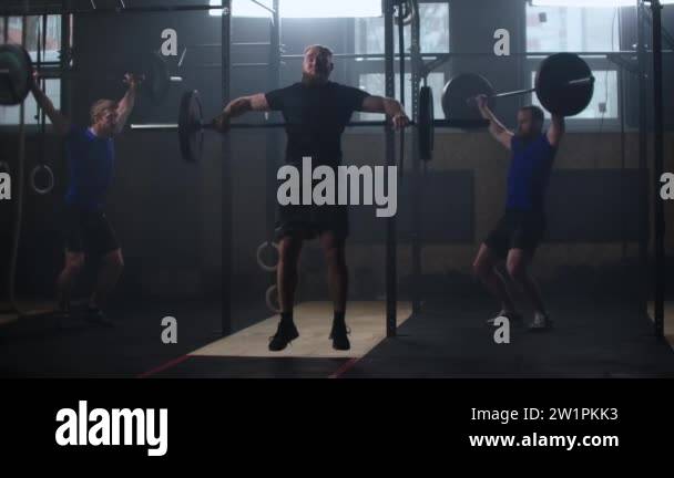 Three fitness man bodybuilder training using barbell weightlifting ...