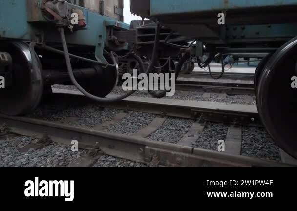 Wheels of the train go on rails. Connecting coupling device between ...