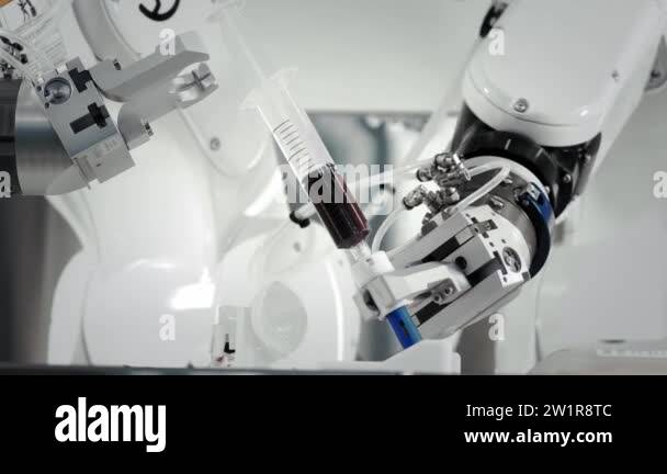 The innovative arms of a robotic arm make an injection of chemotherapy for a cancer patient. New ...