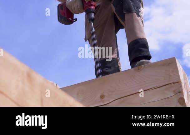 Metal spiral drill for making holes in logs when assembling a wooden ...