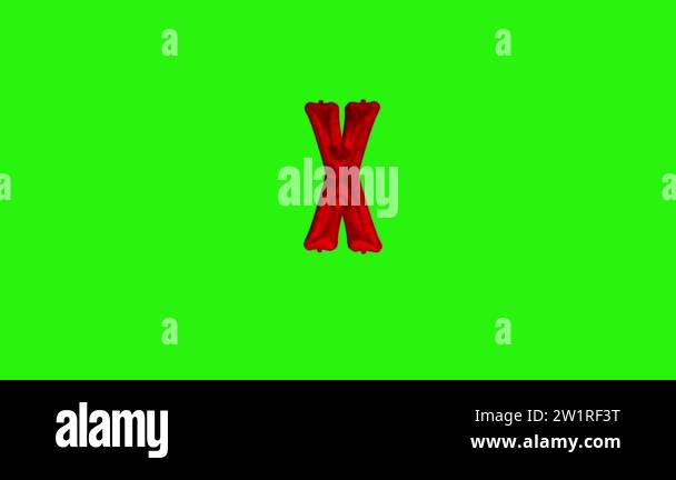 Red letter X. Red foil helium balloon alphabet floating on green screen ...