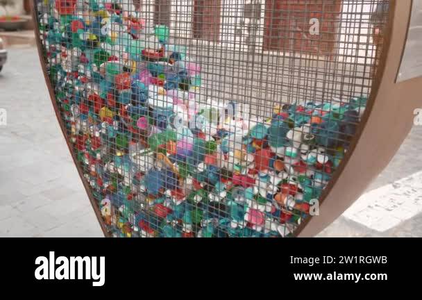 concept of collecting plastic waste and garbage in the cities. Iron ...