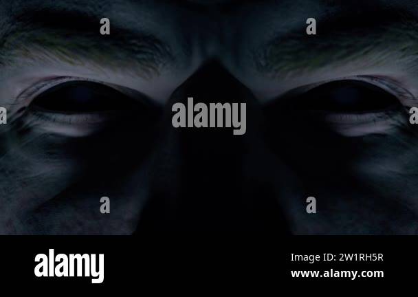 Scary menacing gaze of a man with empty black eyes close-up. Horror ...